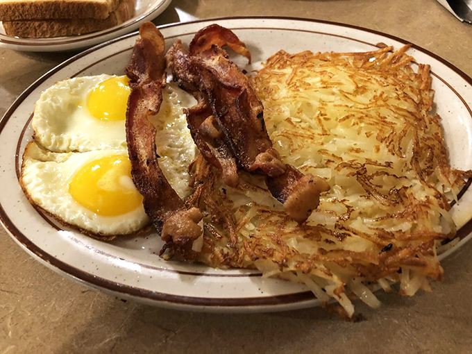 The breakfast trinity&mdash;perfectly cooked eggs, bacon with just the right crispness, and hash browns that could win awards.