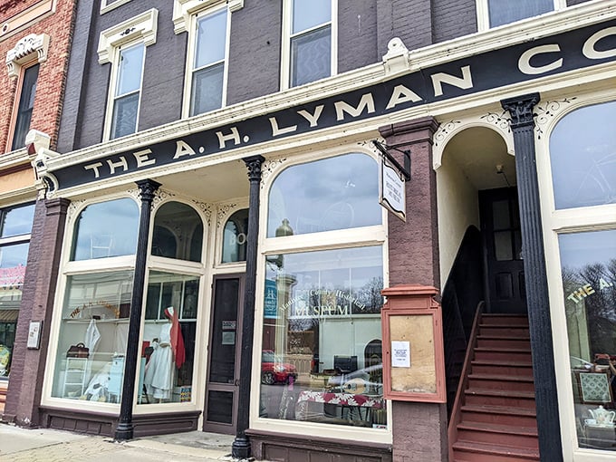 The A.H. Lyman Company building whispers tales of Victorian commerce, when shopping was an event and storefronts were architectural masterpieces.