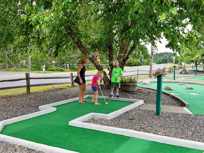 Family fun takes center stage at this mini-golf course, where generations bond over the timeless challenge of navigating the perfect putt.