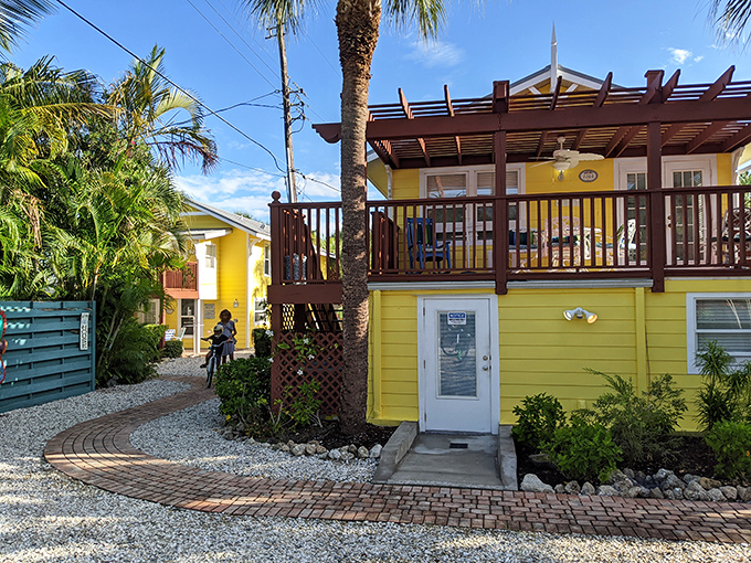 Cheerful yellow cottages with wooden decks capture the essence of island living &ndash; where "home" and "vacation" become synonymous.