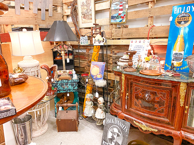 A perfectly curated corner where vintage meets whimsy. That Jack Daniel's sign would look suspiciously perfect in my home office.