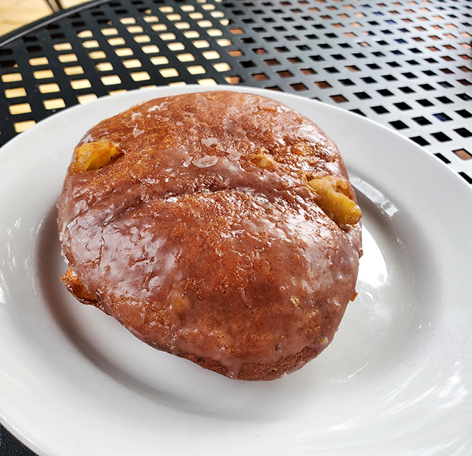 This apple fritter isn't just a pastry, it's a commitment – a gloriously glazed monument to morning indulgence worth every calorie.