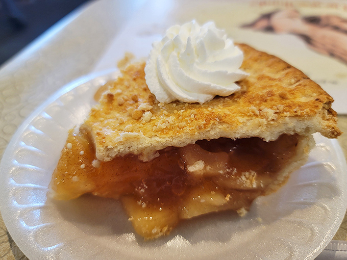 Apple pie with a dollop of whipped cream—proof that sometimes the classics become classics because they're simply unbeatable.