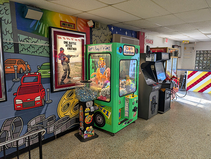 Between features, try your luck at the claw machine. The arcade area keeps fidgety kids happy when monsters aren't roaming the screen.