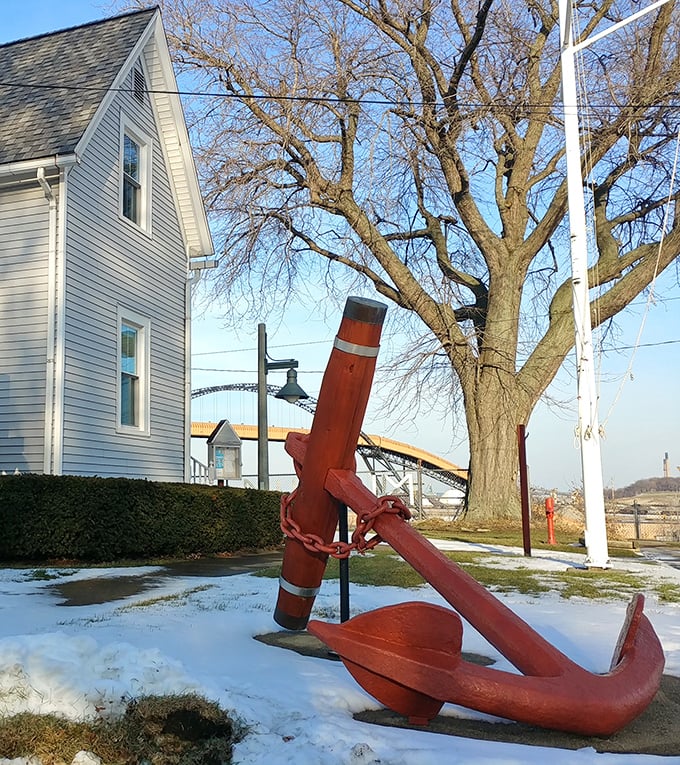 A massive red anchor stands sentinel near the Maritime Museum, a weighty reminder of Ashtabula's deep connection to Great Lakes shipping history.