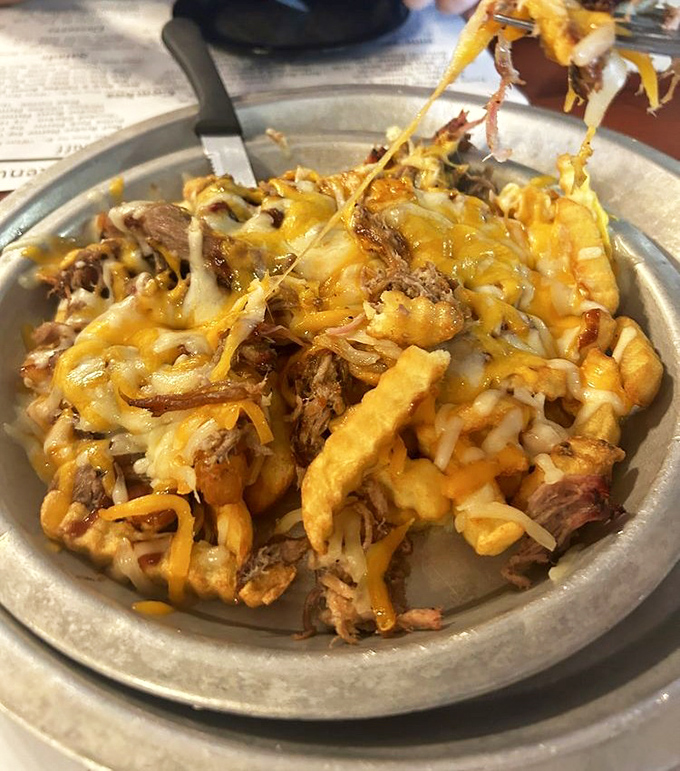 When French fries meet BBQ and cheese, it's not a guilty pleasure&mdash;it's just good sense. The kind of dish that demands to be shared.