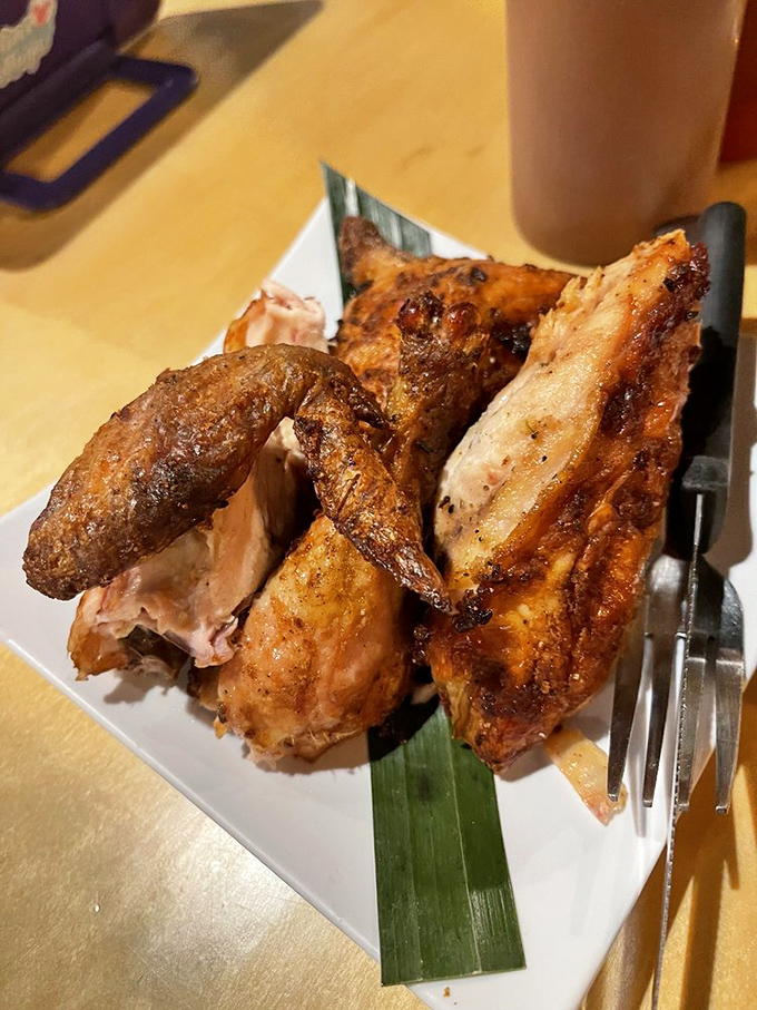 This chicken has clearly been introduced to fire and spices in the most intimate way possible, resulting in skin that crackles and meat that melts.