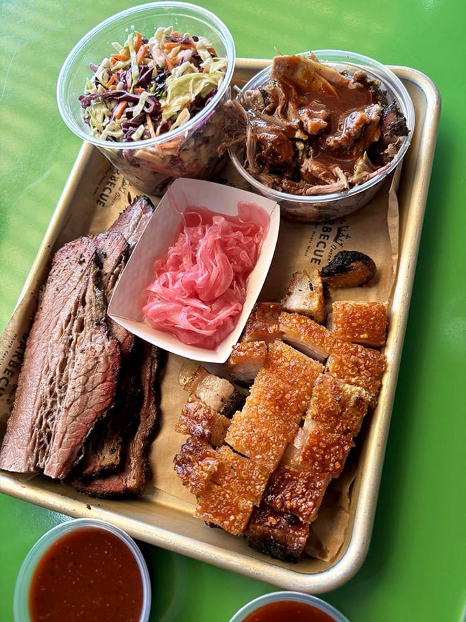 A barbecue sampler that hits all the high notes. The pickled red onions and slaw provide the perfect counterpoint to all that glorious meat.