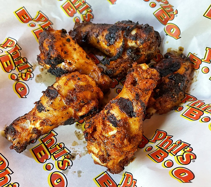 These wings aren't flying anywhere except straight to your happy place, their charred edges telling stories of perfect flame-kissing.