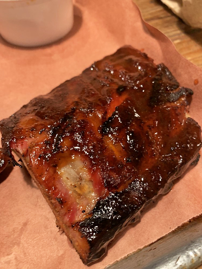Ribs so glazed and glistening they belong in a museum. Though unlike art, you're absolutely encouraged to touch this masterpiece.