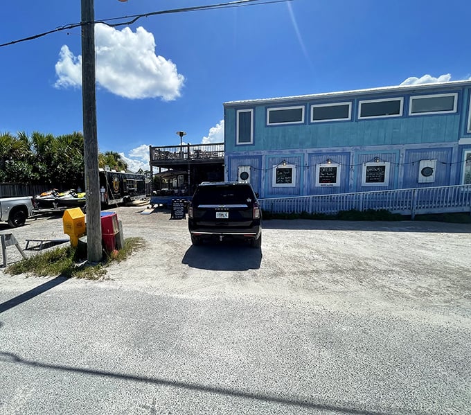 A blue-hued establishment promising seafood treasures. In beach towns, the most unassuming buildings often hide the tastiest surprises.