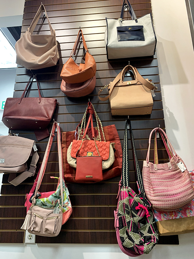 Handbag paradise where designer dreams come true at non-nightmare prices. That coral tote is practically begging for a summer adventure.