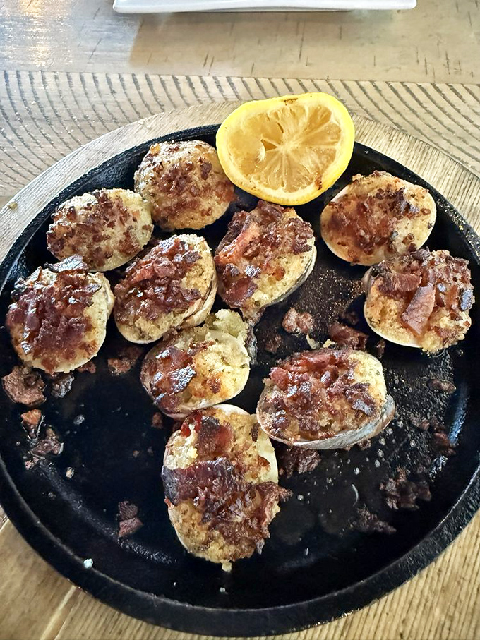 These baked clams with their bacon topping are like little seafood presents. The lemon is there to cut the richness, but who are we kidding?