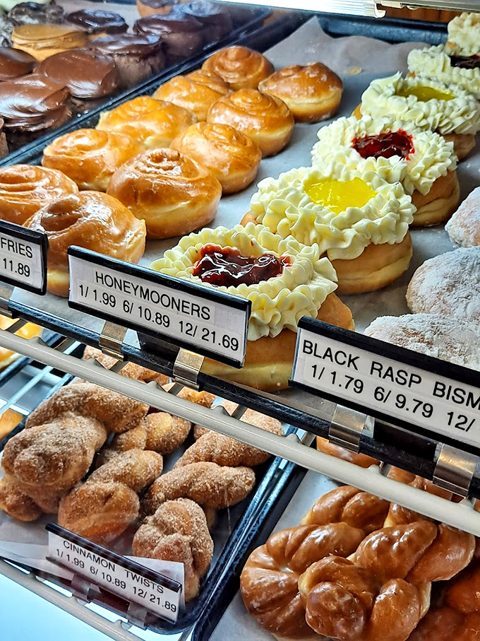 Honeymoon donuts with cream and fruit filling that would make even the most disciplined dieter weak at the knees. These baked goods prove that resistance is futile.