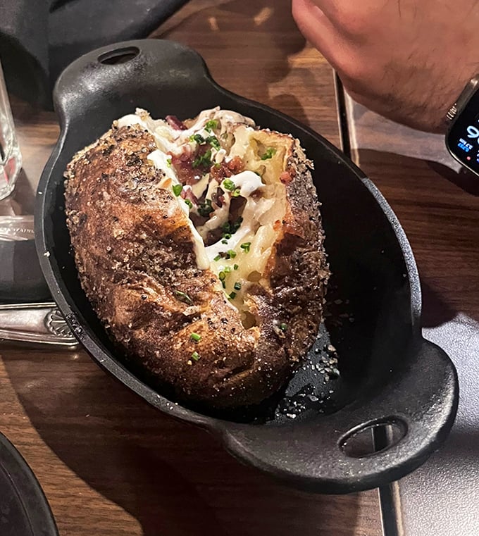 That baked potato isn't just a side&mdash;it's a masterpiece of butter, bacon, and cheese that deserves its own spotlight.