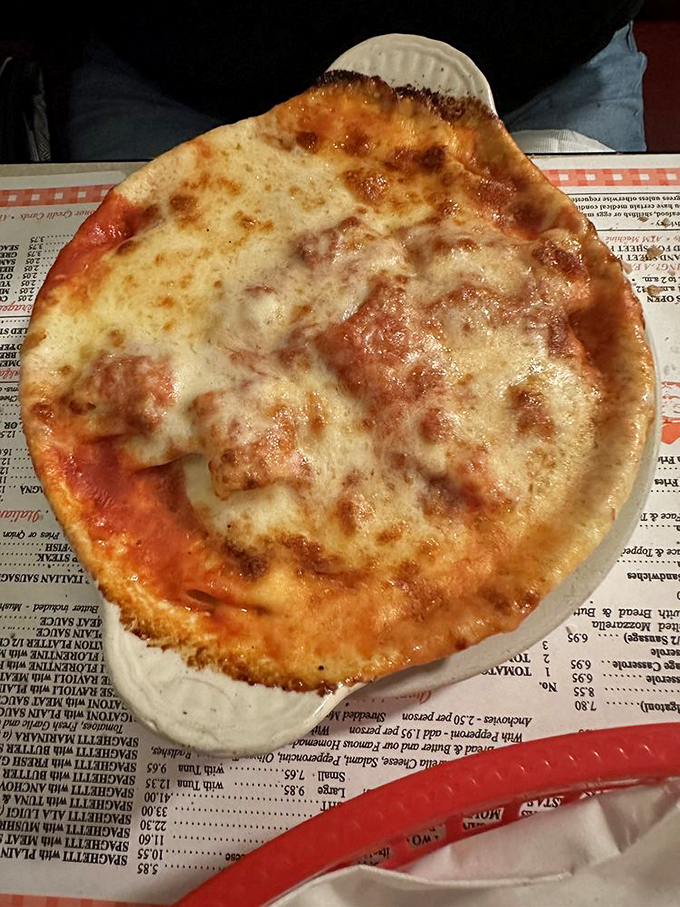 Baked rigatoni that doesn't need fancy plating&mdash;just a simple white plate and the promise of cheese pulling like it's training for the Olympics.
