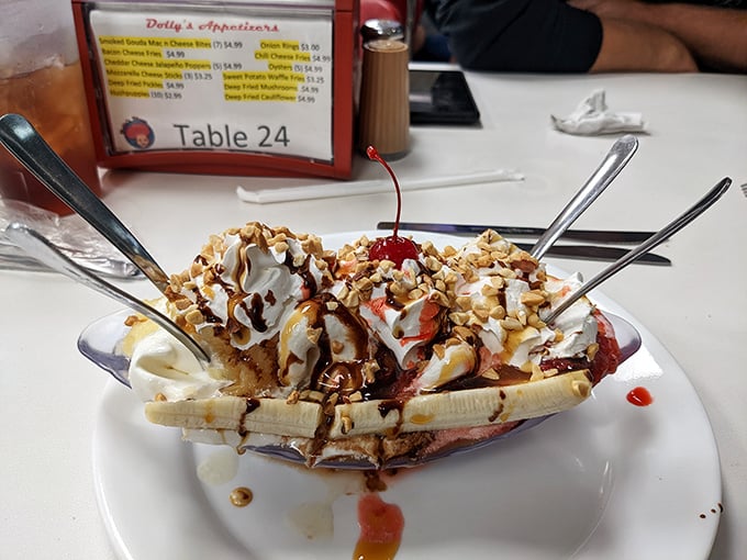 Banana split architecture at its finest&mdash;a structural marvel of ice cream, whipped cream, and toppings that would make Frank Lloyd Wright put down his blueprints and pick up a spoon.