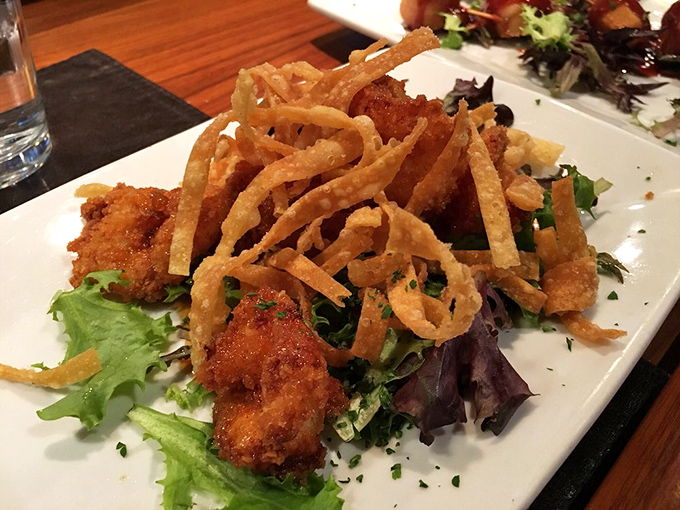 Crispy meets creamy in this bang bang shrimp dish, where the crunch of fried coating gives way to tender seafood beneath.