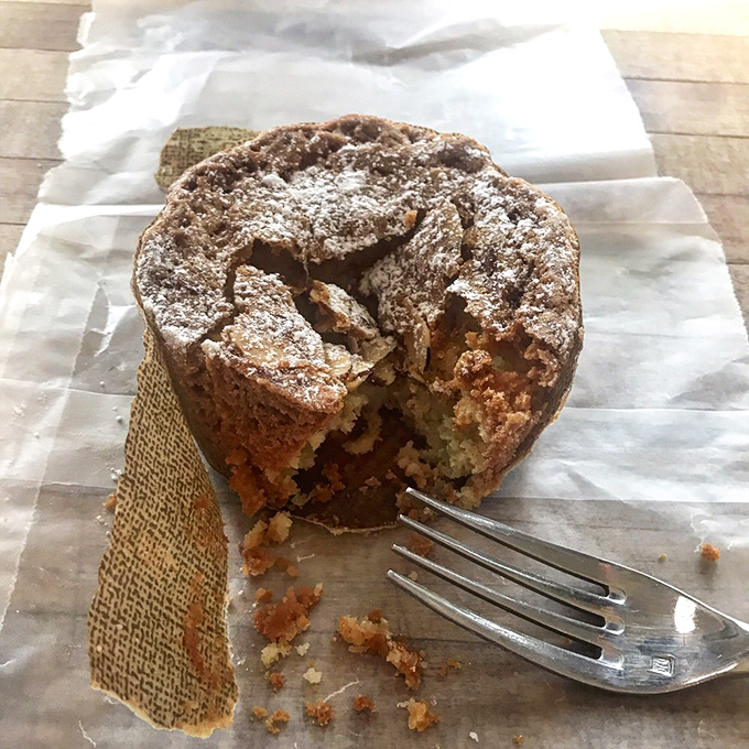 This rustic cake with its fork-marked top isn't trying to win beauty contests; it's too busy preparing to blow your mind with its first crumbly bite.