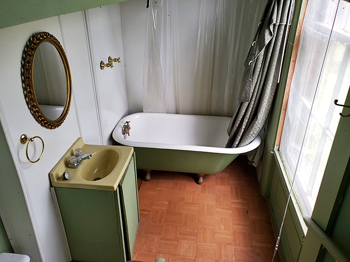 Even the bathroom maintains that authentic 19th-century charm &ndash; modern convenience meets Victorian elegance in perfect harmony.