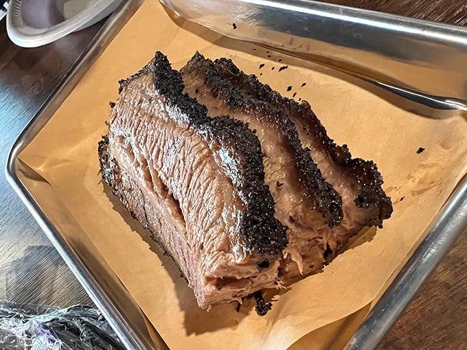 Brisket so perfectly smoked it makes you wonder if the pitmaster has some sort of supernatural pact with fire and time.