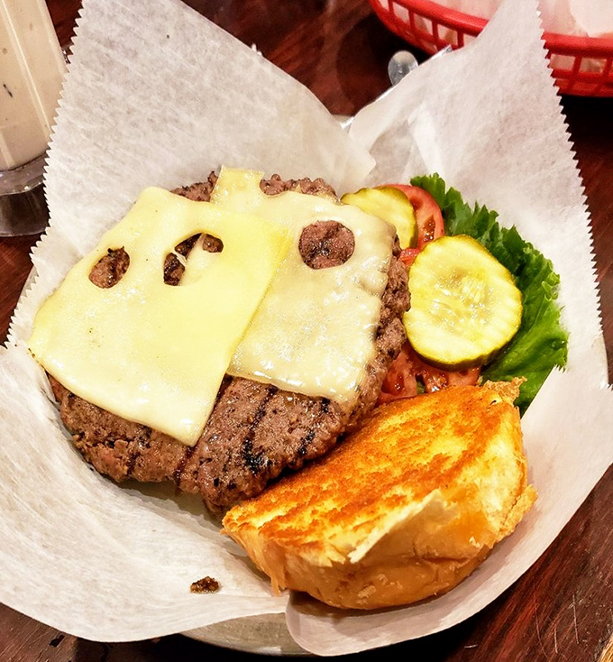 A burger so photogenic it deserves its own Instagram account. That cheese melt is what food dreams are made of.