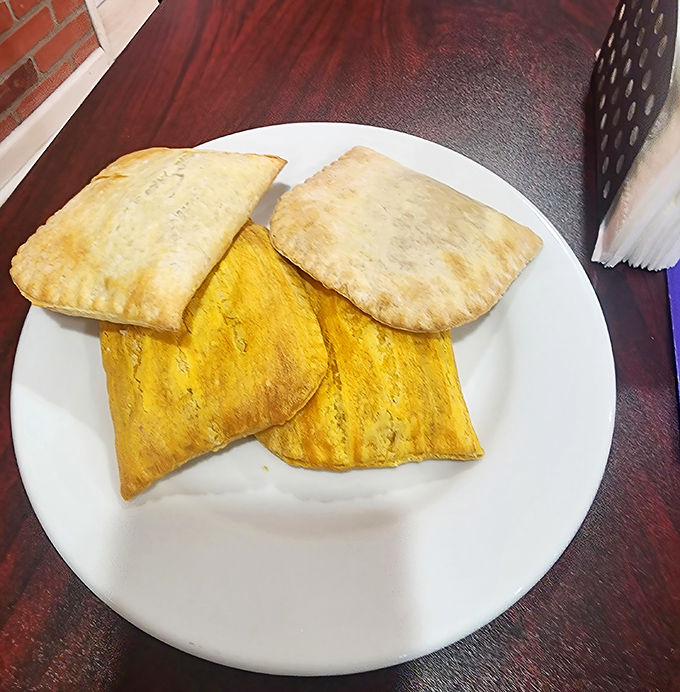 These aren't just pastries – they're handheld happiness pockets filled with savory goodness that'll disappear faster than your diet resolutions.