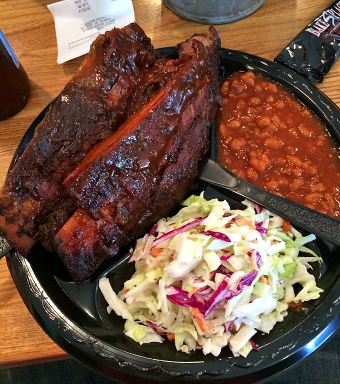 These beef ribs aren't messing around—they're the Fred Flintstone of barbecue, making you question whether your table needs a reinforced foundation.