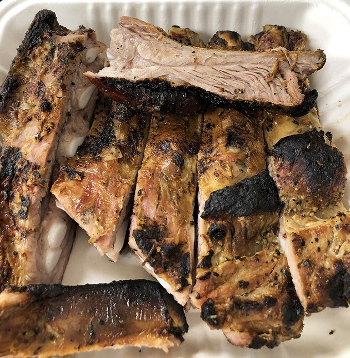 These beef ribs look like they came from a brontosaurus. Fred Flintstone would need a bigger car to take these home.