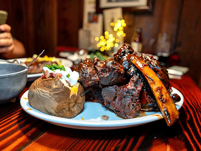 These beef ribs aren't just dinner; they're a primal experience that would make Fred Flintstone's car tip over with envy.