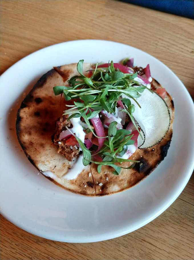 A beautifully crafted taco that proves sometimes the simplest presentations deliver the most complex, satisfying flavors.