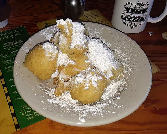 These beignets aren't just dusted with powdered sugar&mdash;they're having a full-on snowball fight with it. Sweet surrender!
