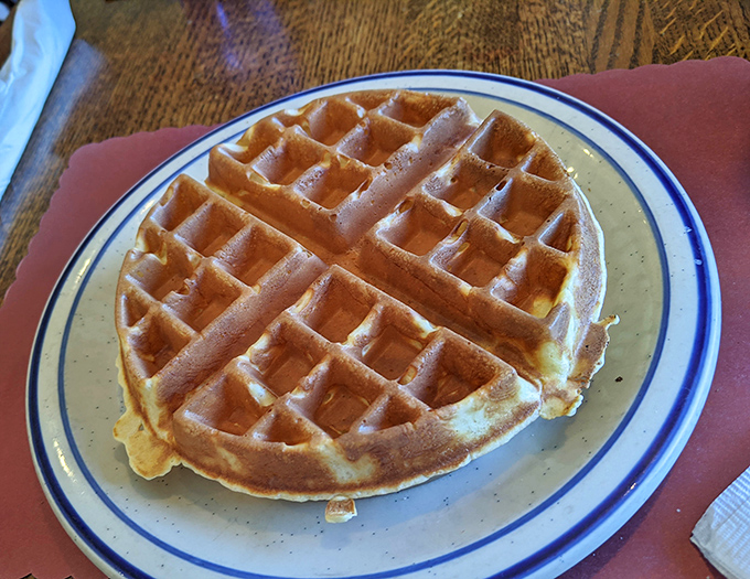 This Belgian waffle isn't just breakfast&mdash;it's architecture. Those perfect grid patterns are practically begging for maple syrup rivers.