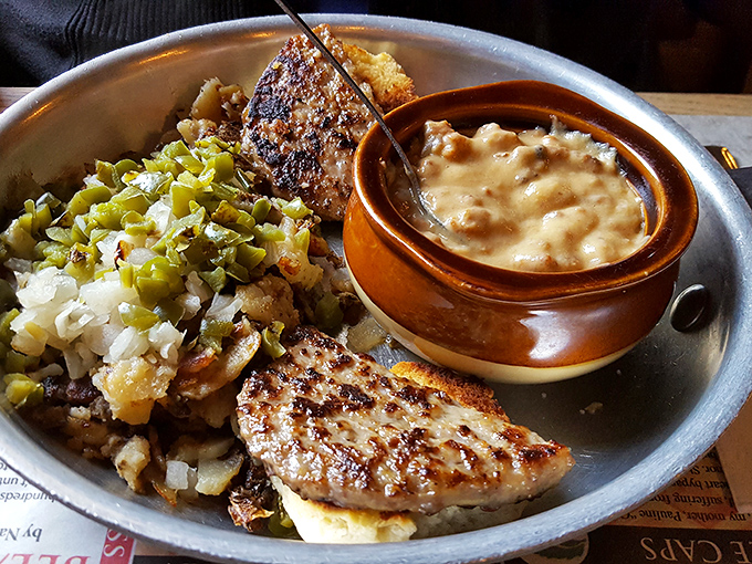 Home fries mingling with green peppers and a side of creamy gravy. This isn't just breakfast&mdash;it's edible therapy for whatever ails you.