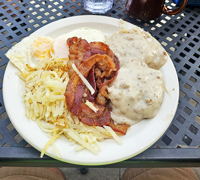 Biscuits and gravy with eggs and bacon&mdash;the breakfast that says "your diet starts tomorrow" in the most delicious way possible.
