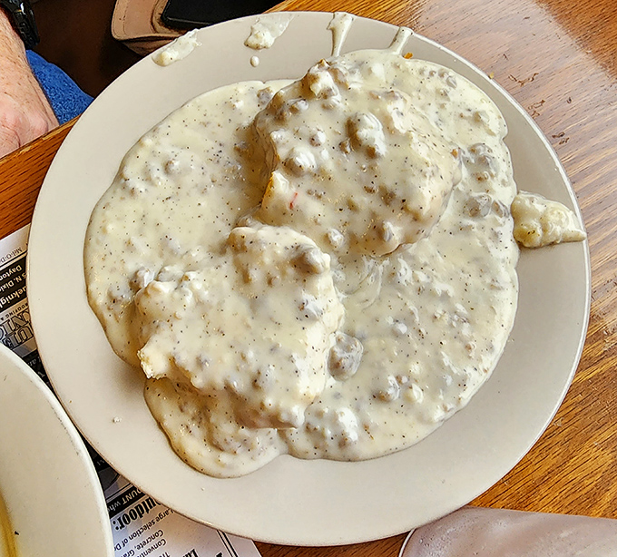 Biscuits and gravy&mdash;the edible security blanket of the Midwest. This plate contains more comfort than an entire season of "The Great British Baking Show." 
