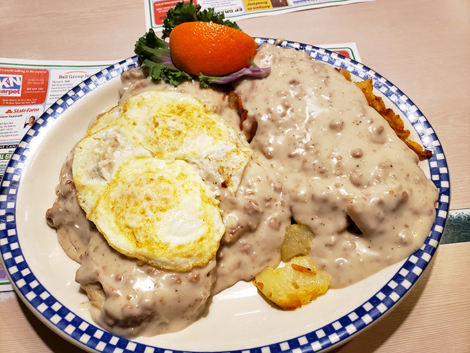 Biscuits and gravy &ndash; the breakfast that hugs you from the inside, with sunny-side eggs standing by for moral support.