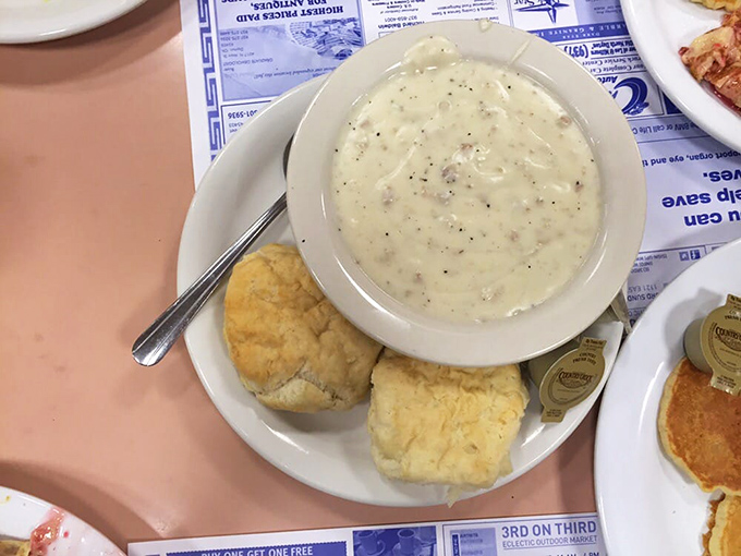 The legendary biscuits and gravy in their natural habitat. That pepper-flecked cream gravy could make even your most health-conscious friend temporarily abandon their principles.