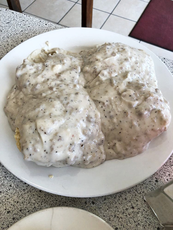 Behold the holy grail&mdash;biscuits completely obscured by gravy so perfectly peppered it should have its own fan club. Worth every extra minute on the treadmill.