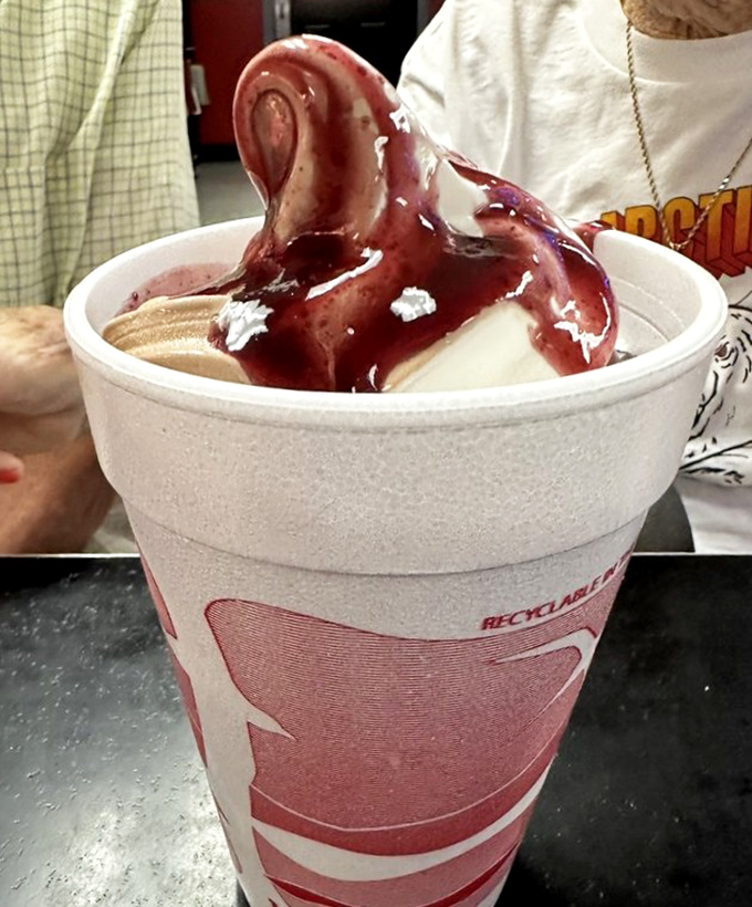 This black raspberry sundae doesn't just satisfy a sweet tooth—it creates a temporary religion where the only commandment is "Thou shalt savor every spoonful."