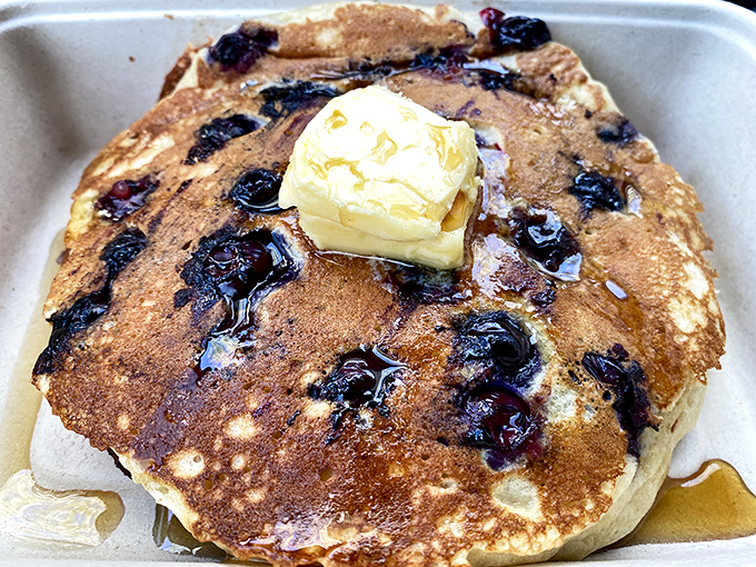 These blueberry pancakes aren't just breakfast &ndash; they're edible sunshine with bursts of berry joy and a butter crown melting into maple-soaked perfection.