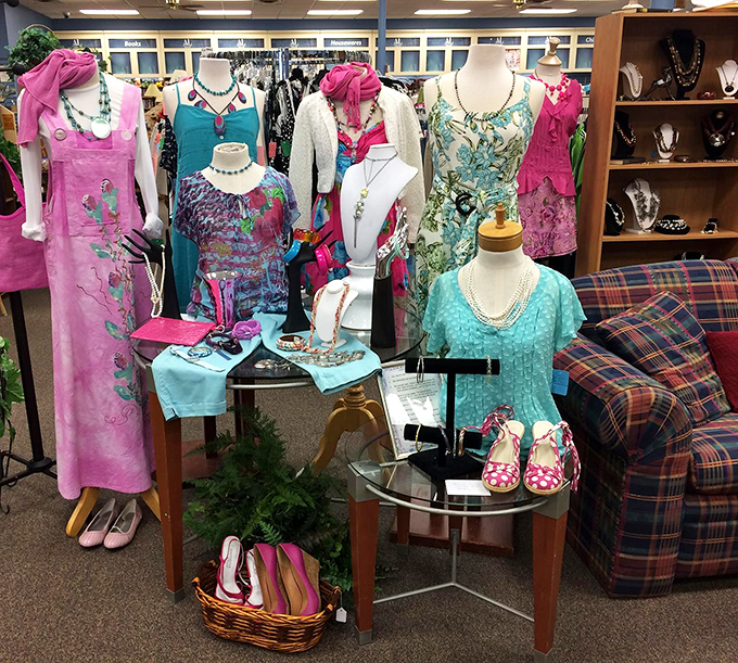 The mannequin squad shows off coordinated outfits in shades that scream "resort vacation." That pink and turquoise combo is giving serious Florida retirement vibes.