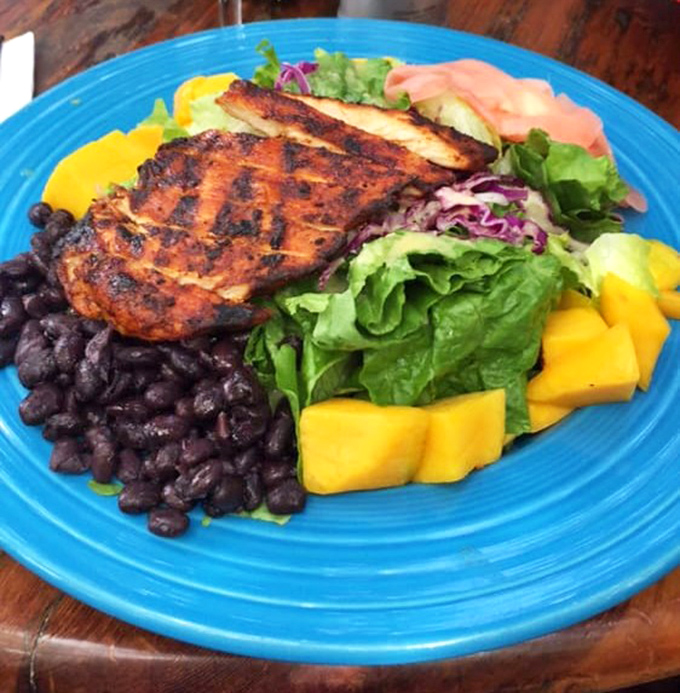 The Brazilian Chicken Salad brings tropical vacation vibes to your table with grilled chicken, black beans, and mango that dance together in perfect harmony.
