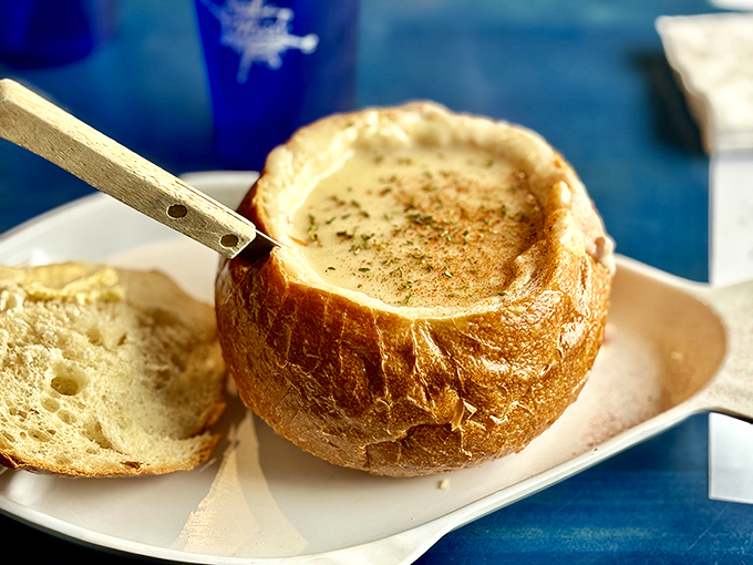 Edible architecture at its finest&mdash;a sourdough bread bowl that transforms from vessel to treasure as it soaks up every last drop.