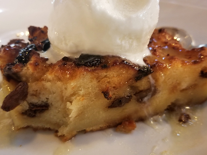 Bread pudding that would make your grandmother jealous. That scoop of ice cream melting into warm, caramelized goodness is pure dessert poetry.