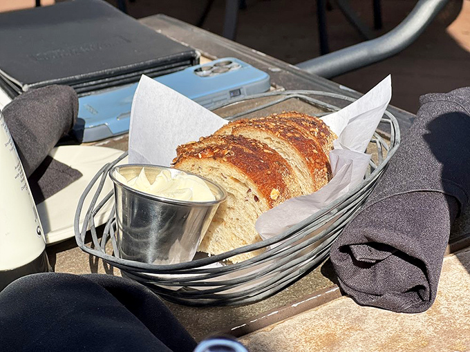 Fresh-baked bread arrives in a wire basket like a warm welcome, with butter that's actually spreadable&mdash;a small miracle in restaurant dining.