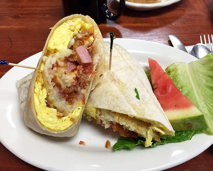 Breakfast burritos should be judged by their cross-section, and this one passes with flying colors. A perfect ratio of egg, potato, and breakfast meats.