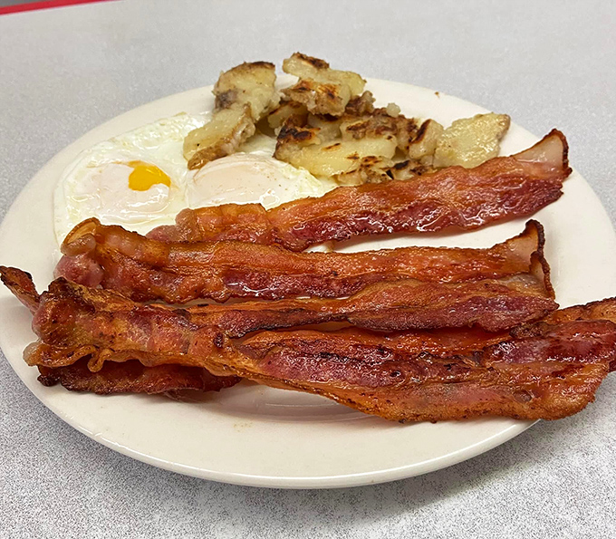 The breakfast platter that launched a thousand productive days. Those home fries have the perfect crisp-to-tender ratio that most restaurants only dream about.