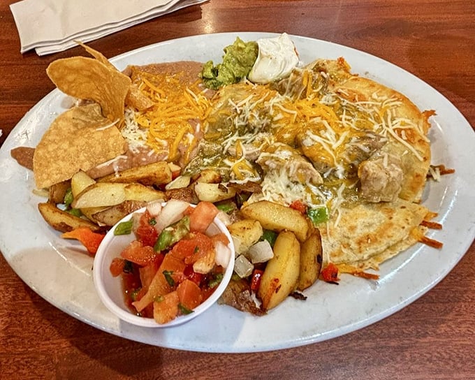 Breakfast ambition realized in cheese-covered glory. This isn't just a morning meal&mdash;it's what breakfast dreams about when it goes to sleep at night.