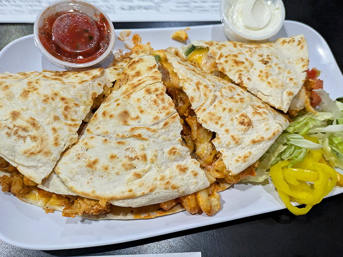 A quesadilla that's had an identity crisis and emerged better for it—stuffed with tender brisket and melty cheese.